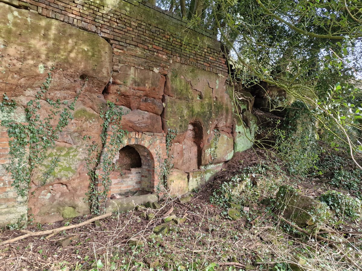 An old building is hidden behind Dilhorne Hall